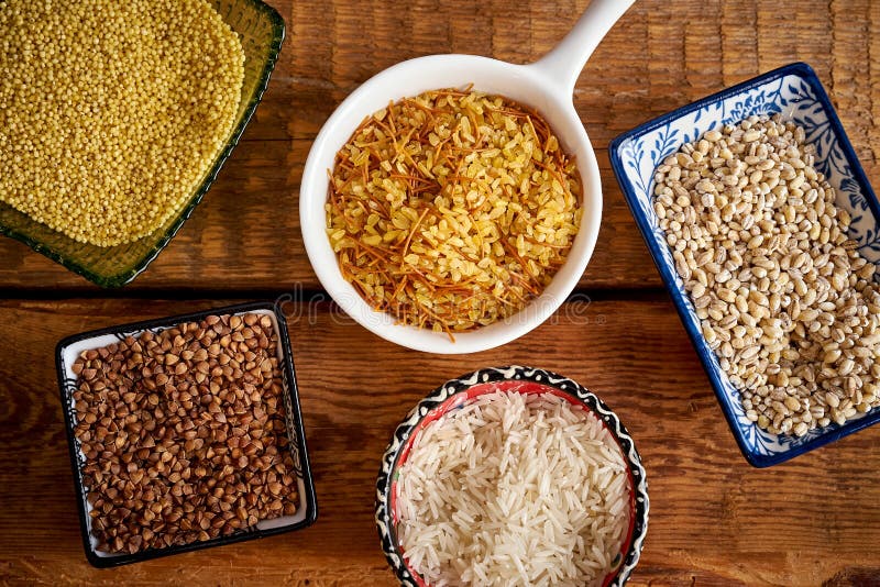 Top View of Several Types of Porridge in Different Bowls on an Wooden ...