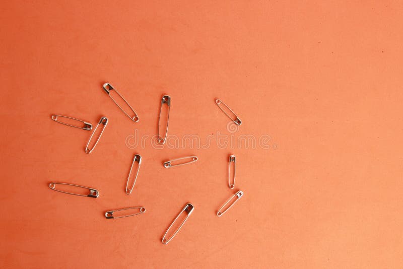 Top View of the Sewing Pins on the Red Surface Stock Image - Image of ...