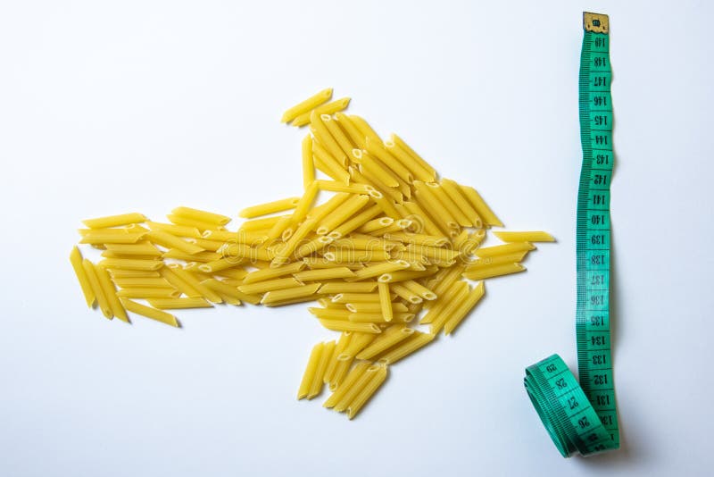 Top View in the Shape of an Arrow from Raw Pasta Indicates a Measuring ...