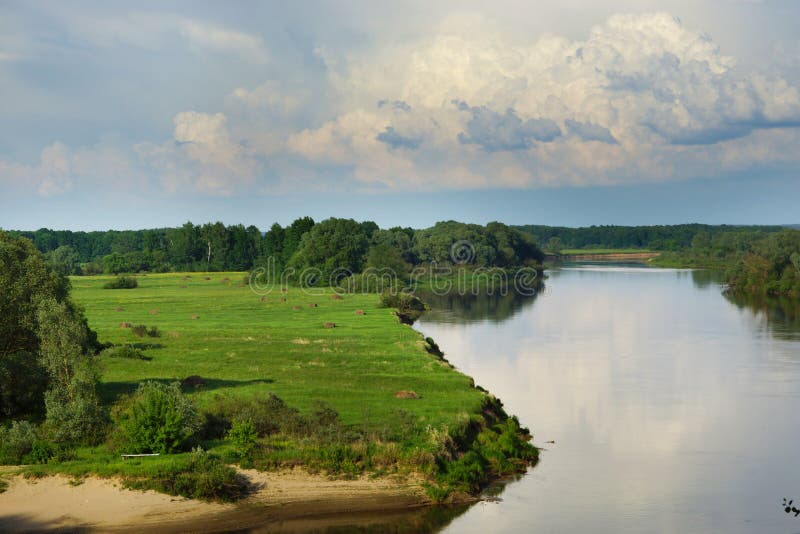 Top View of the Shore of the River with Green Grass and Harvested ...