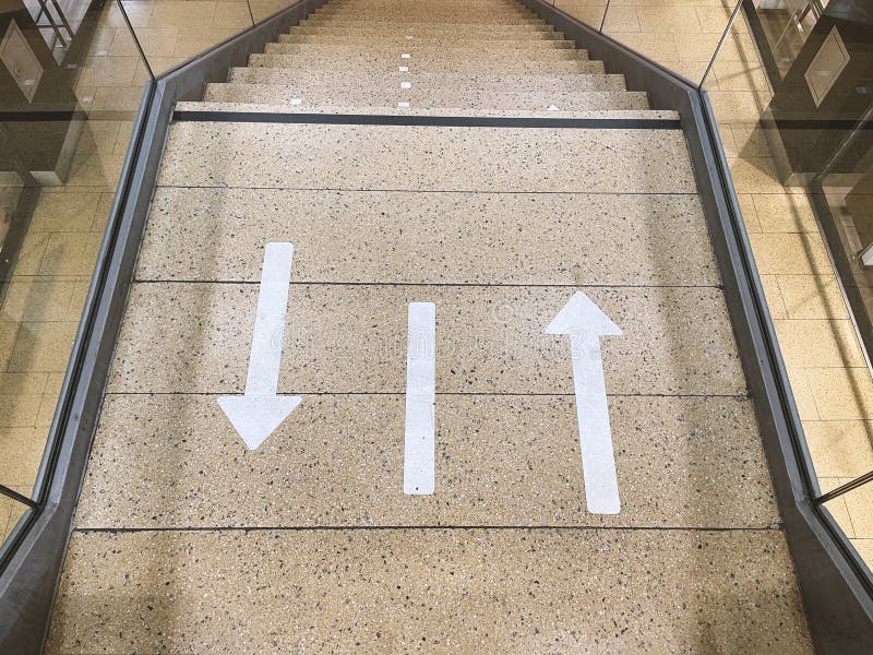 Top View Shot of the Arrow Sign on the Stairs Stock Photo - Image of ...