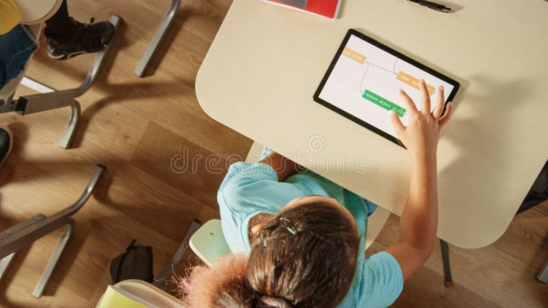 Top View Shot in Elementary School Computer Science Classroom: Children ...