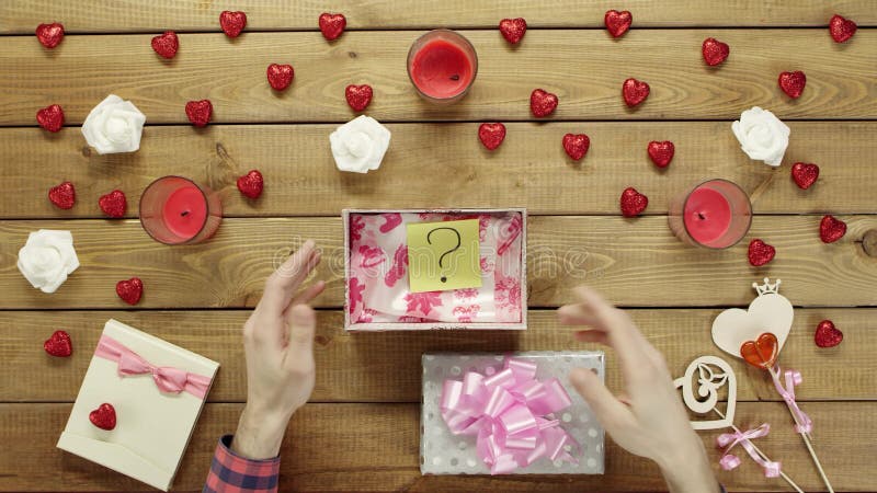 Sad Man Gets Sticky Note with Question Mark As Holiday Gift, Top View ...