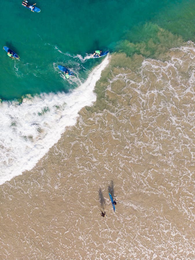 Top View Shot of People with Surfboards Swimming in Varkala Beach ...