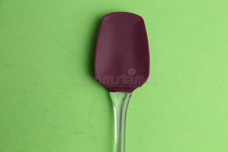 Top View of Silicon Spatula Isolated on a Green Background Stock Photo ...
