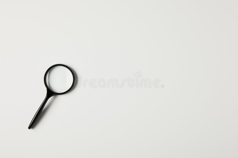 Top View of Single Magnifying Glass with Handle Isolated on Grey Stock ...