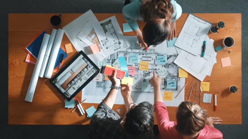 Top View of Skilled Engineer Working Together To Design Building ...