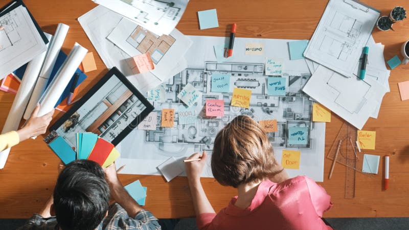 Top View of Skilled Engineer Working Together To Design Building ...