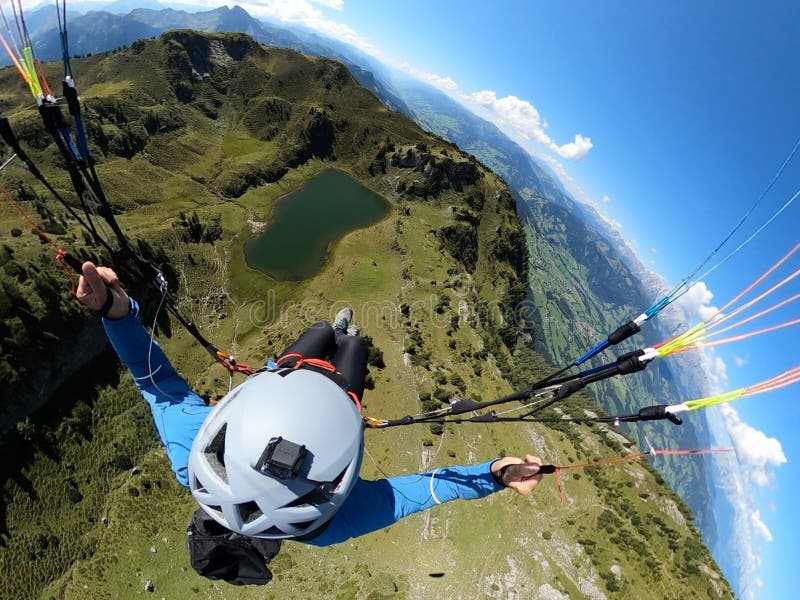 Top View of a Skydiver Paragliding on a Scenic Landscape with a ...