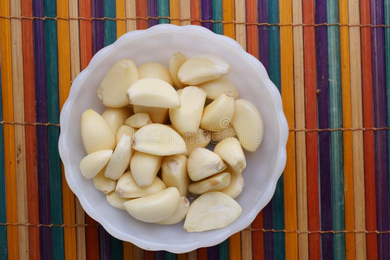 Top View of Slice of Garlic in a Bowl on Table Stock Image - Image of ...