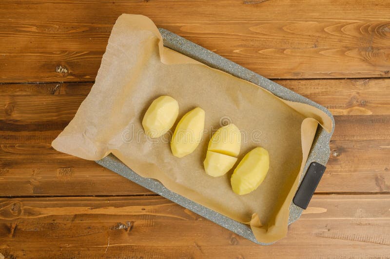 Top View of Sliced Potato on a Parchment in Baking Tray Stock Image ...