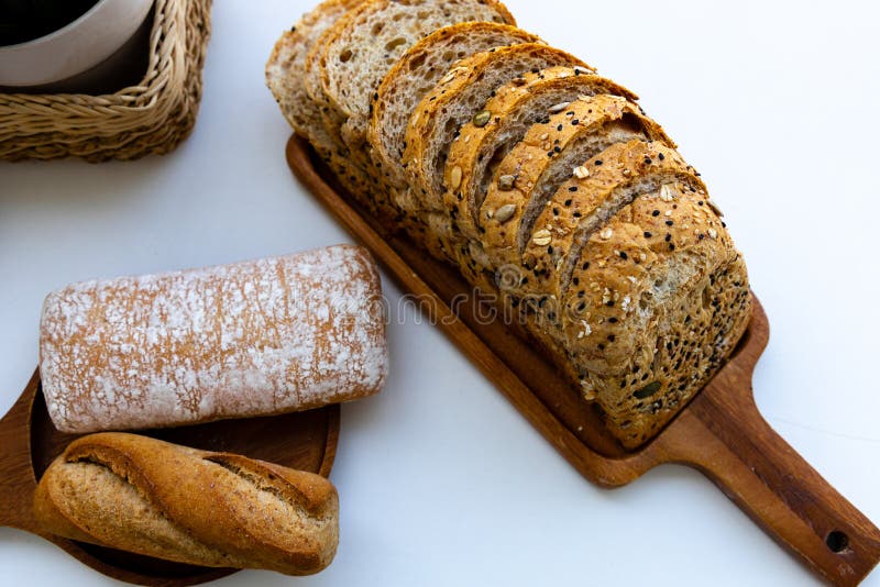 Top View of Sliced Wholegrain Bread on White Table Stock Photo - Image ...
