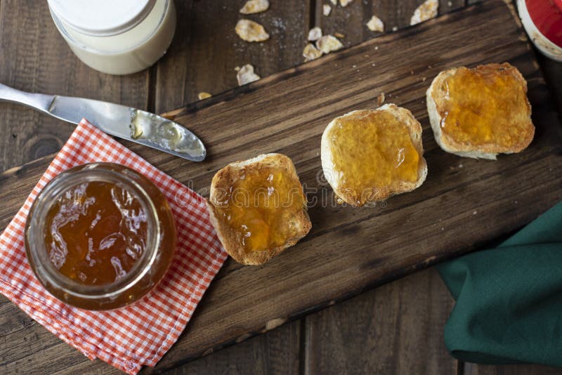 Top View of Slices of Bread Spread with Jam and a Jar of Jam with Knife ...
