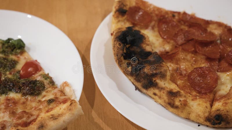 Top View of Slices of Pepperoni Pizza and Vegetable Pizza on White ...
