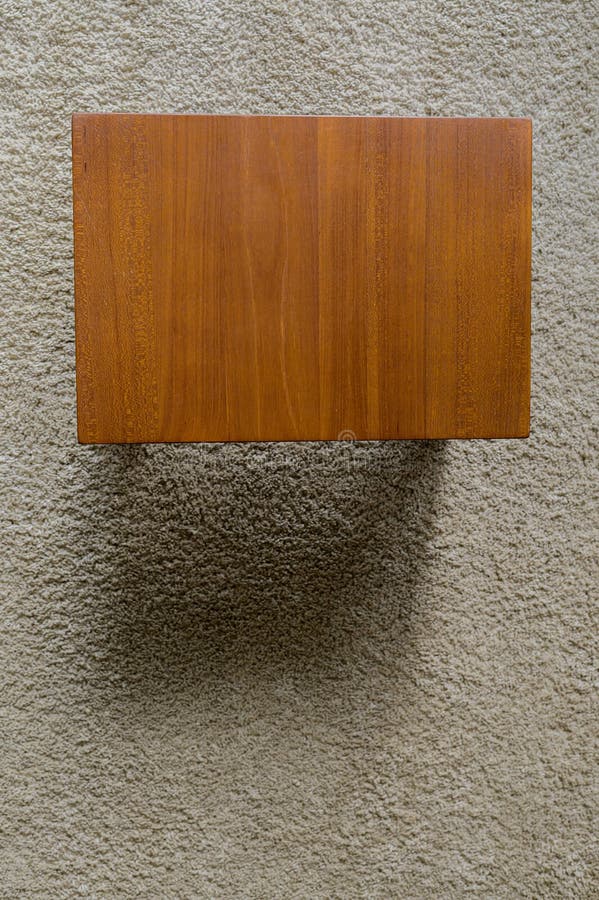 Top View of Small Teak Table on Beige Carpet. Stock Photo - Image of ...