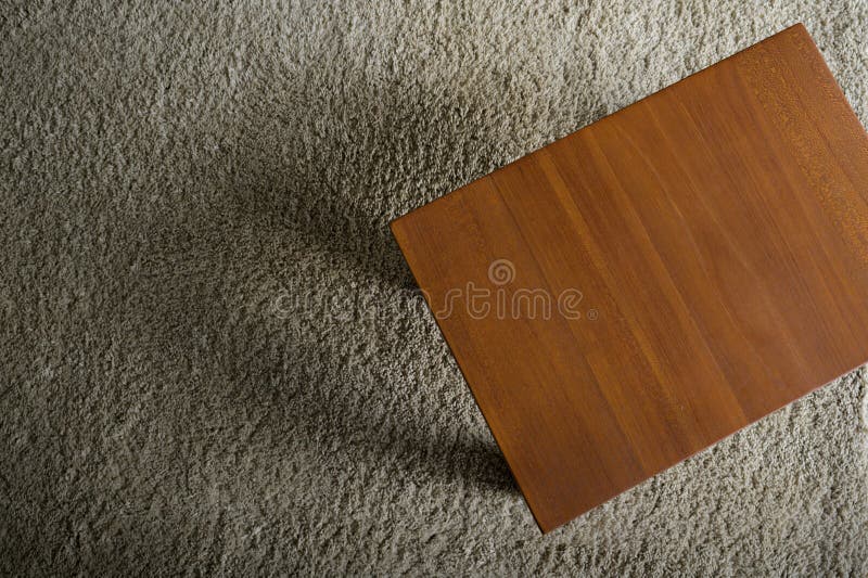 Top View of Small Teak Table on Beige Carpet. Stock Photo - Image of ...