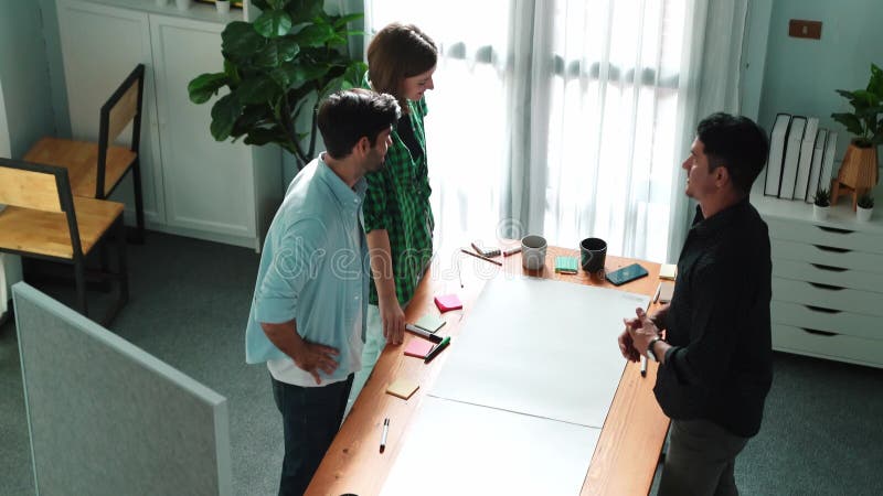 Top View of Team Explain and Discuss about Plan at Meeting Table ...