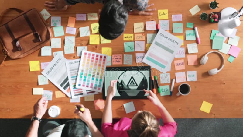 Top View of Designer Holding Palette while Manager Look at Design ...