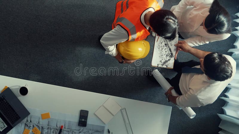 Top View of Smart Engineer Looking at Building Design at Meeting ...