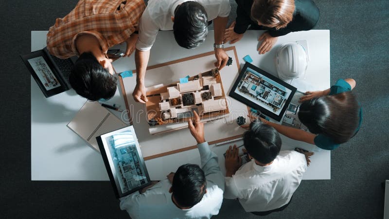 Top View of Smart Manager Point at House Model and Explain Design ...