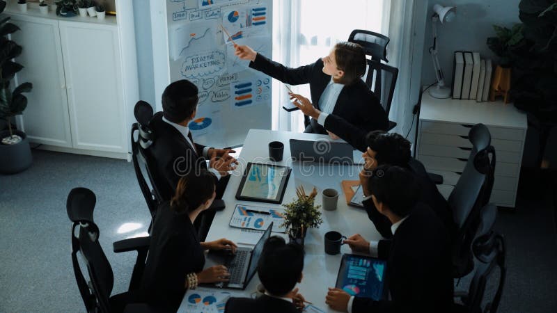 Top View of Smart Manager Pointing at Whiteboard and Explain Idea ...