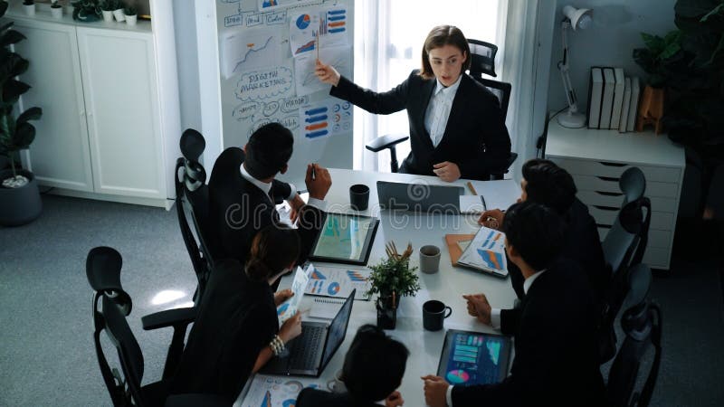 Top View of Smart Manager Pointing at Whiteboard and Explain Idea ...