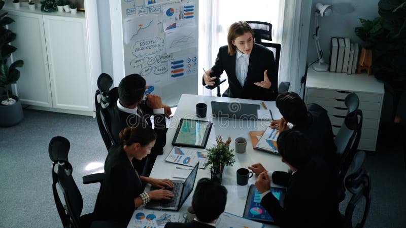 Top View of Smart Manager Pointing at Whiteboard and Explain Idea ...