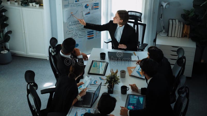 Top View of Smart Manager Pointing at Whiteboard and Explain Idea ...