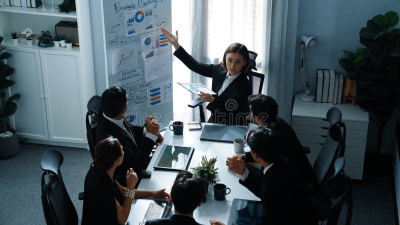 Top View of Smart Manager Pointing at Whiteboard and Explain Idea ...