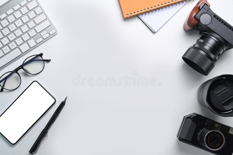 Smart Phone, Glasses, Notebook and Camera Accessories on Photographer ...