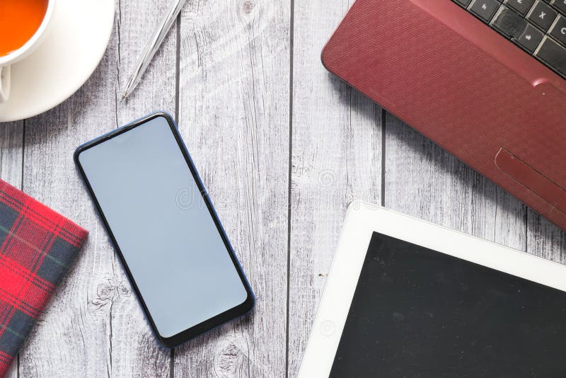 Top View of Smart Phone, Laptop and Notepad on Table Stock Image ...