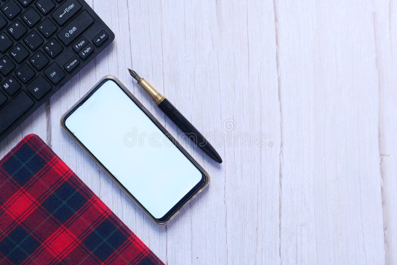 Top View of Smart Phone and Notepad on Table Stock Photo - Image of ...