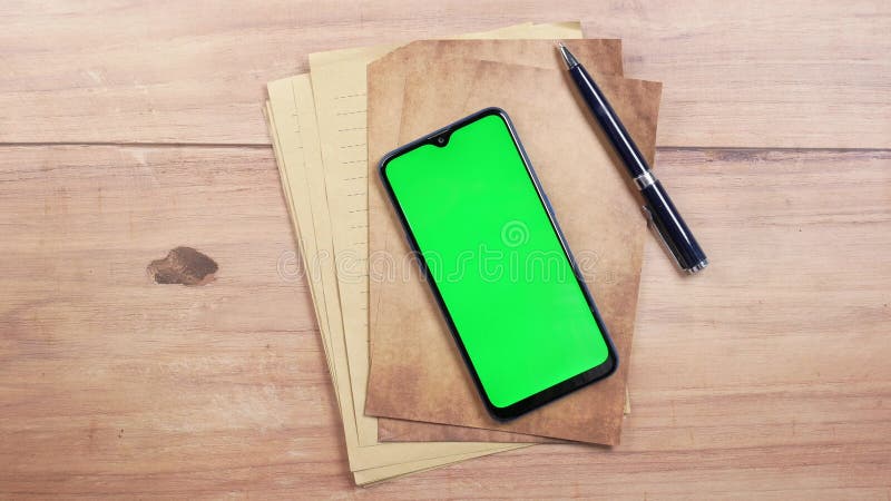 Top View of Smart Phone and Notepad on Table Stock Video - Video of ...