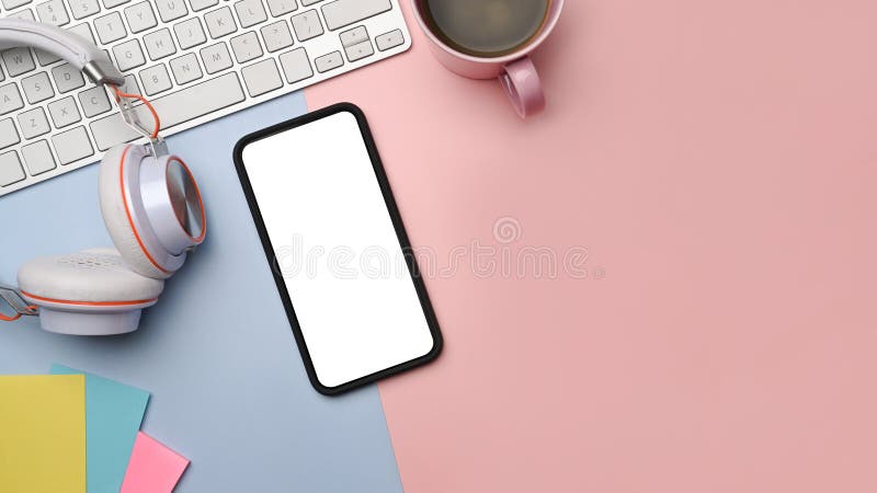Smart Phone, Sticky Note, Keyboard and Headphone on Blue and Pink ...