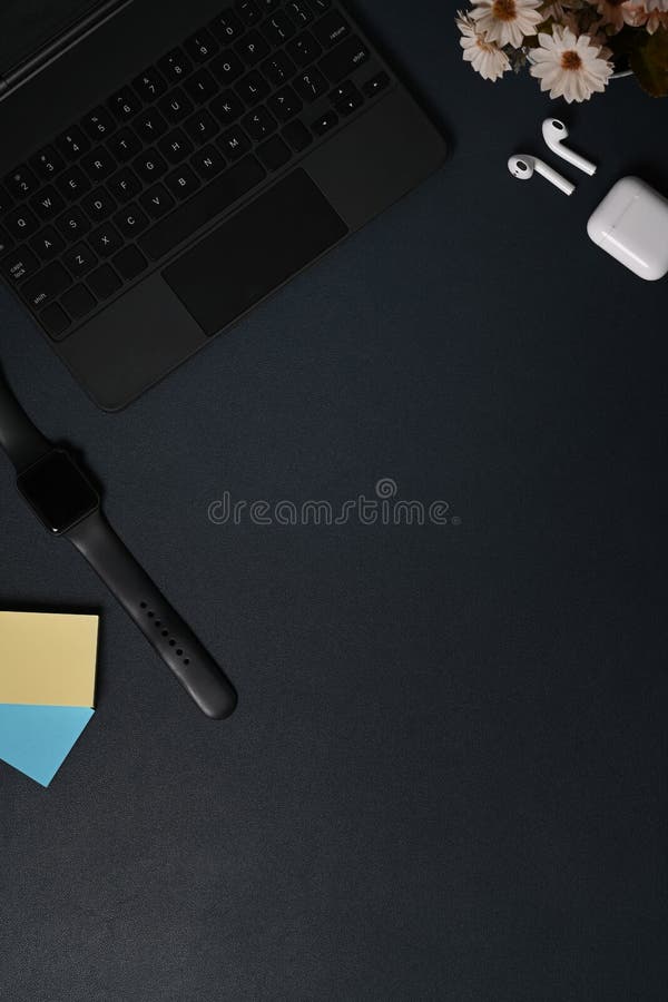 Smart Watch, Laptop Computer and Earphones on Black Leather. Stock ...