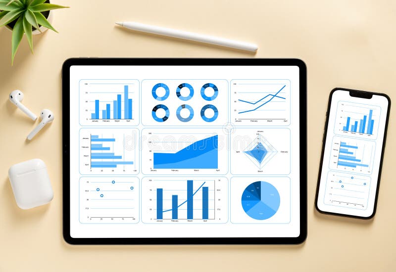 Top View of Smartphone and Tablet with Reports and Graphs on Screen ...
