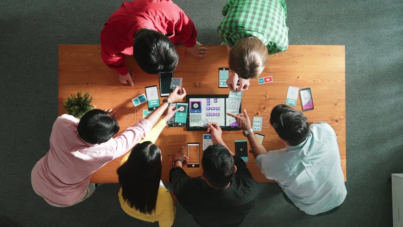 Top View Of Software Developer Team Looking Ux Design From Tablet 8109