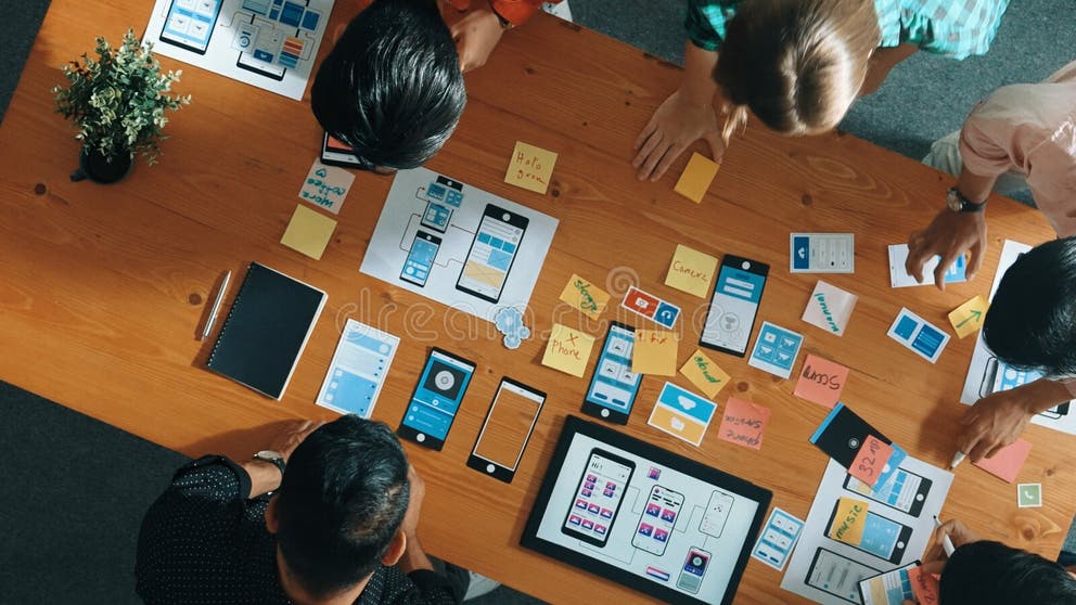 Top View of Software Developer Team Looking Ux Design from Tablet ...