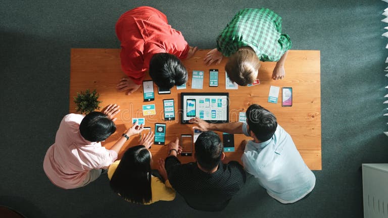 Top View of Software Developer Team Looking Ux Design from Tablet ...