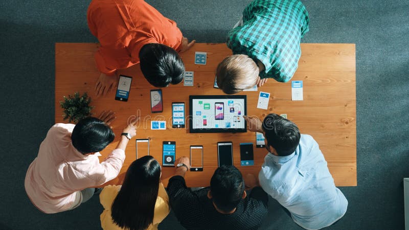 Top View of Software Developer Team Looking Ux Design from Tablet ...
