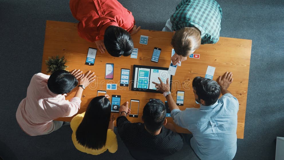 Top View of Software Developer Team Looking Ux Design from Tablet ...