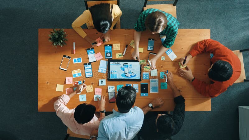 Top View of Software Developer Team Looking Ux Design from Tablet ...