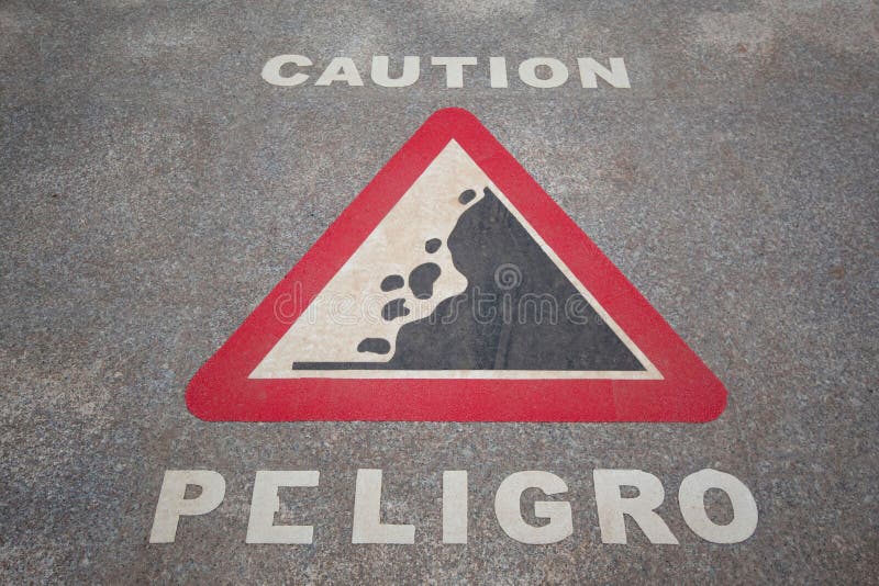 Top View of a Spanish Road Sign - Translation: Caution Danger Stock ...
