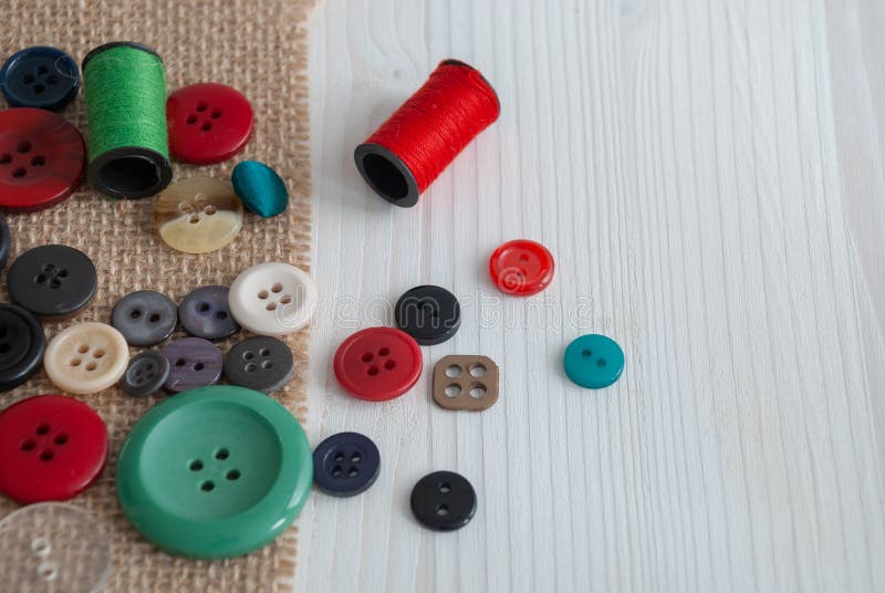 Top View of Spools of Thread and Buttons Stock Photo - Image of wooden ...