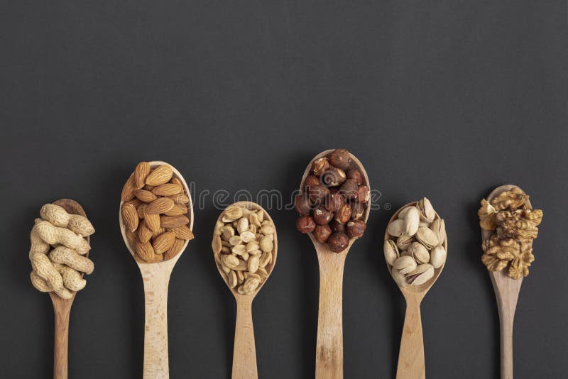 Top View Spoons with Variety Nuts. High Quality Photo Stock Image ...