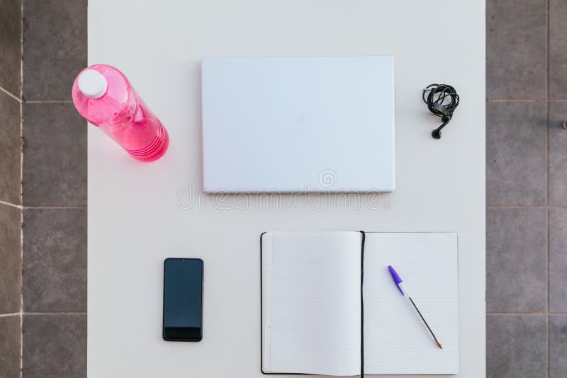 Top View of a Square Table with a Computer, Smartphone, Notepad, Pen ...