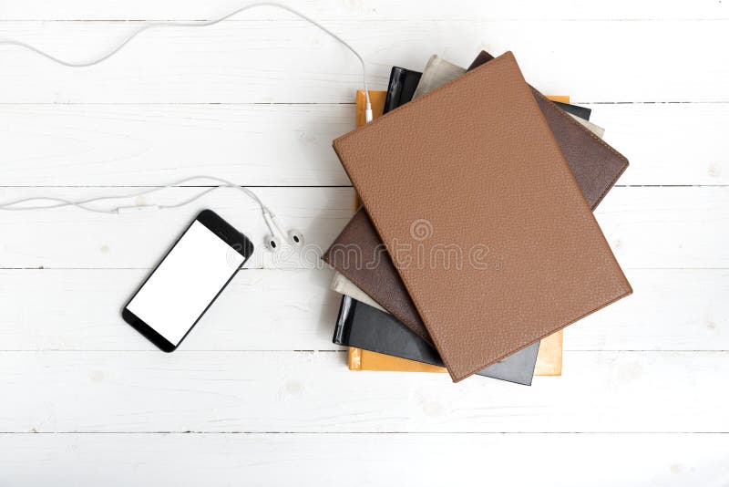 Open Textbook, Notebook, Smartphone, Laptop Computer, Stack of Books ...