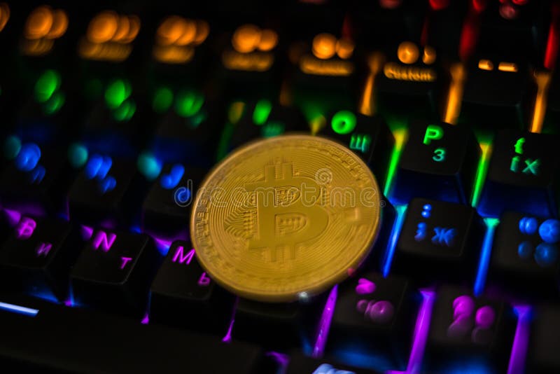 Top View Stack of Golden Bitcoins Money on Computer Light Keyboard ...