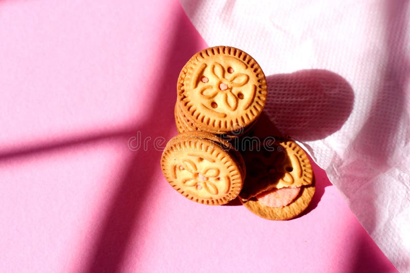 Top View of Stacked Biscuits on Pink Background Stock Photo - Image of ...