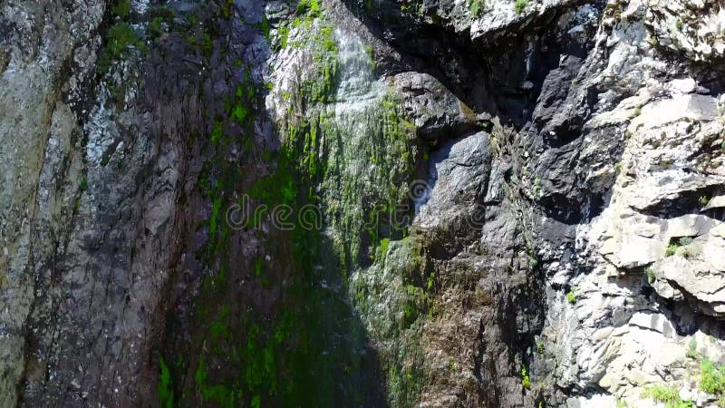 Top View of Steep Mountain Cliffs and an Ice Cave. Stock Footage ...